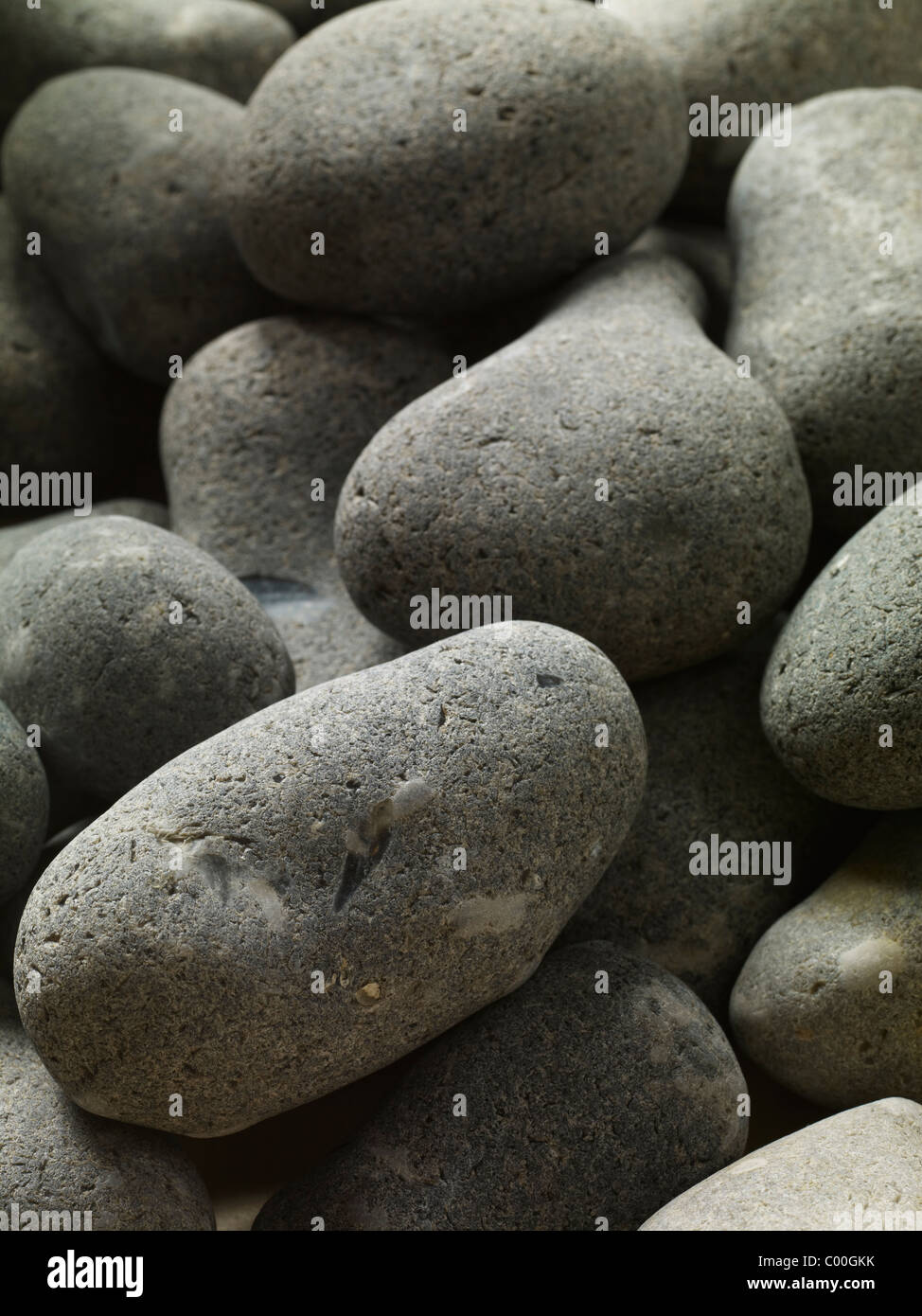 granite pebbles round and smooth forming an abstract background Stock ...