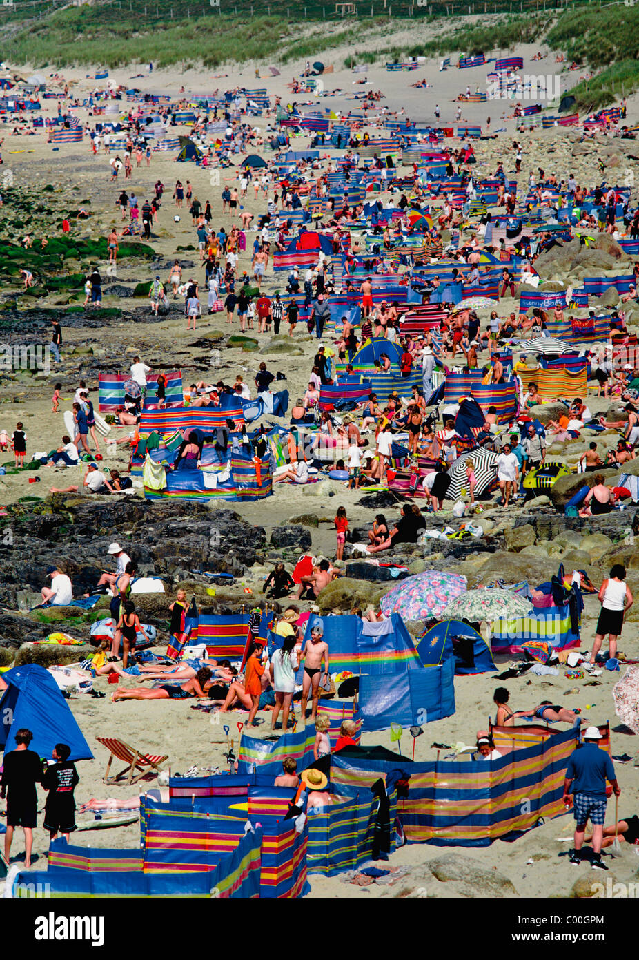 Holiday makers on St Just beach Stock Photo - Alamy