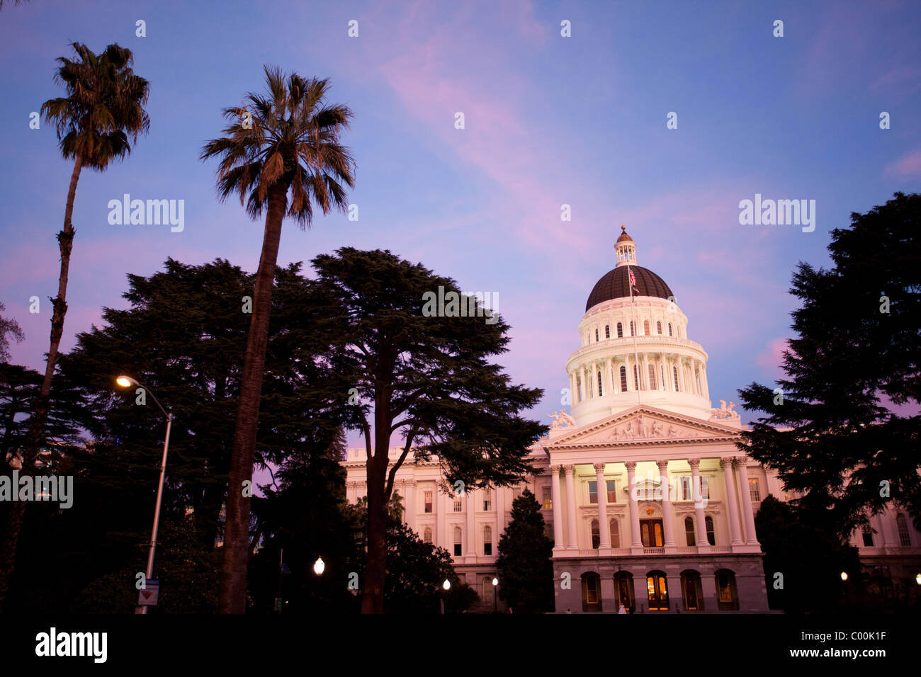 California State Capitol with Palm Trees at Sunset Stock Photo - Alamy