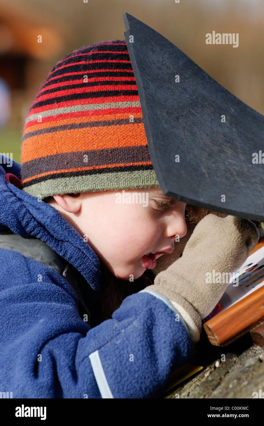 A young boy on a nature trail at Conwy RSPB reserve Stock Photo - Alamy