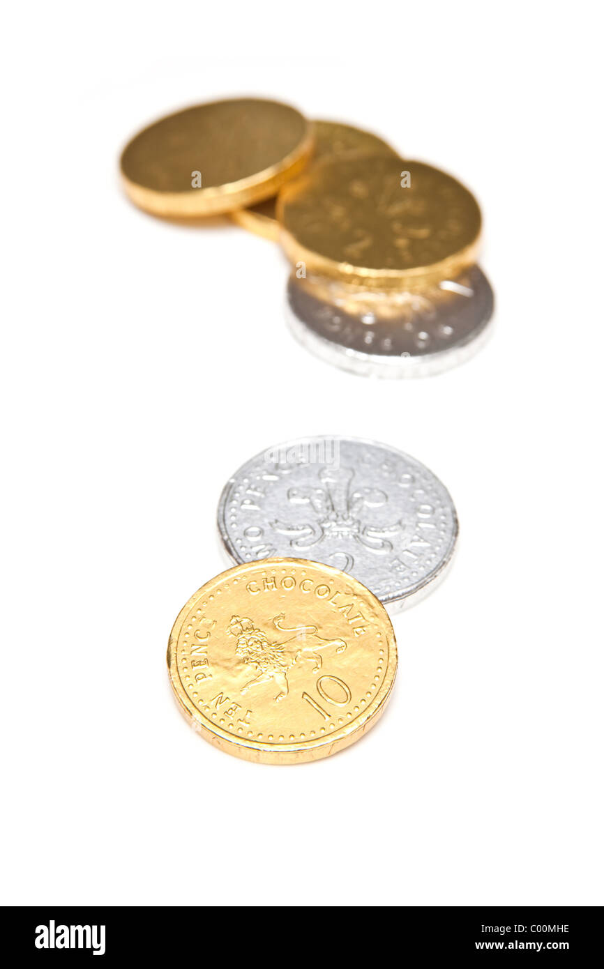 Chocolate money coins isolated on a white studio background Stock Photo ...