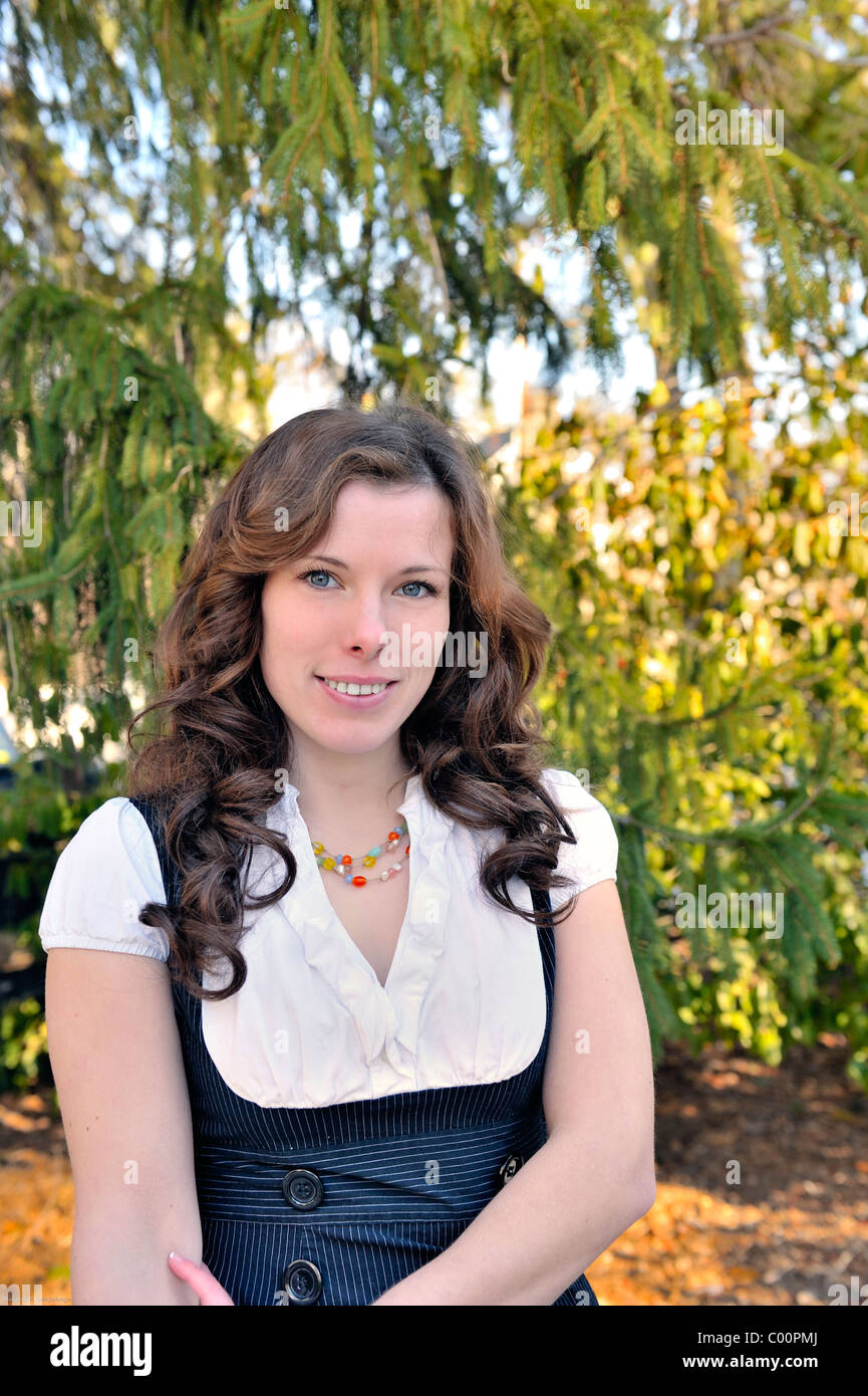 Beautiful Young Woman 20s outdoor portrait three-quarter view facing ...