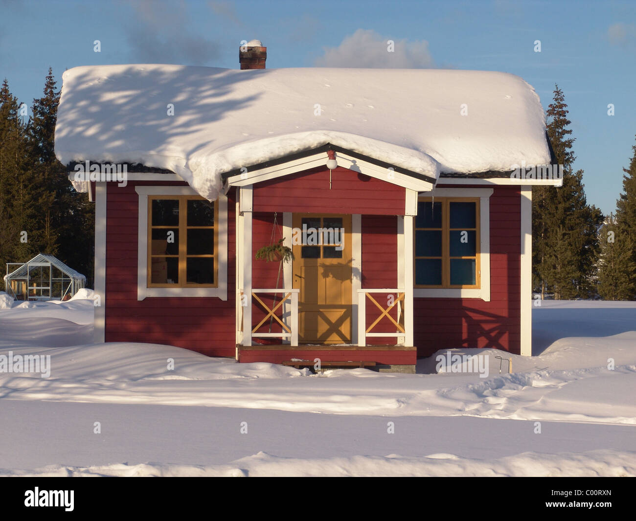 Little cottage in Norway with snow on roof Stock Photo - Alamy