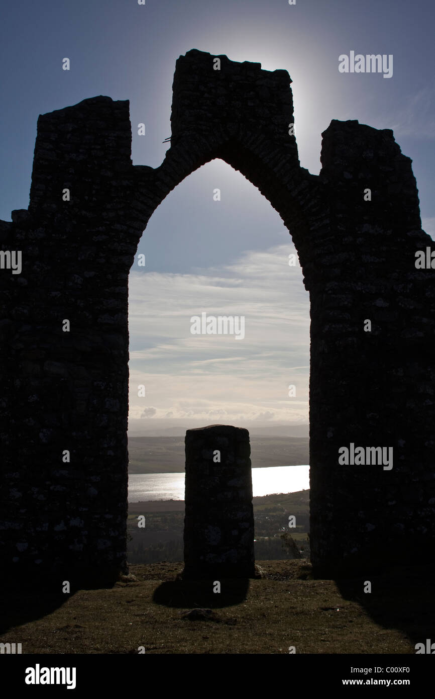 Silhouette of Fyrish Monument on Fyrish Hill in Easter Ross overlooking ...