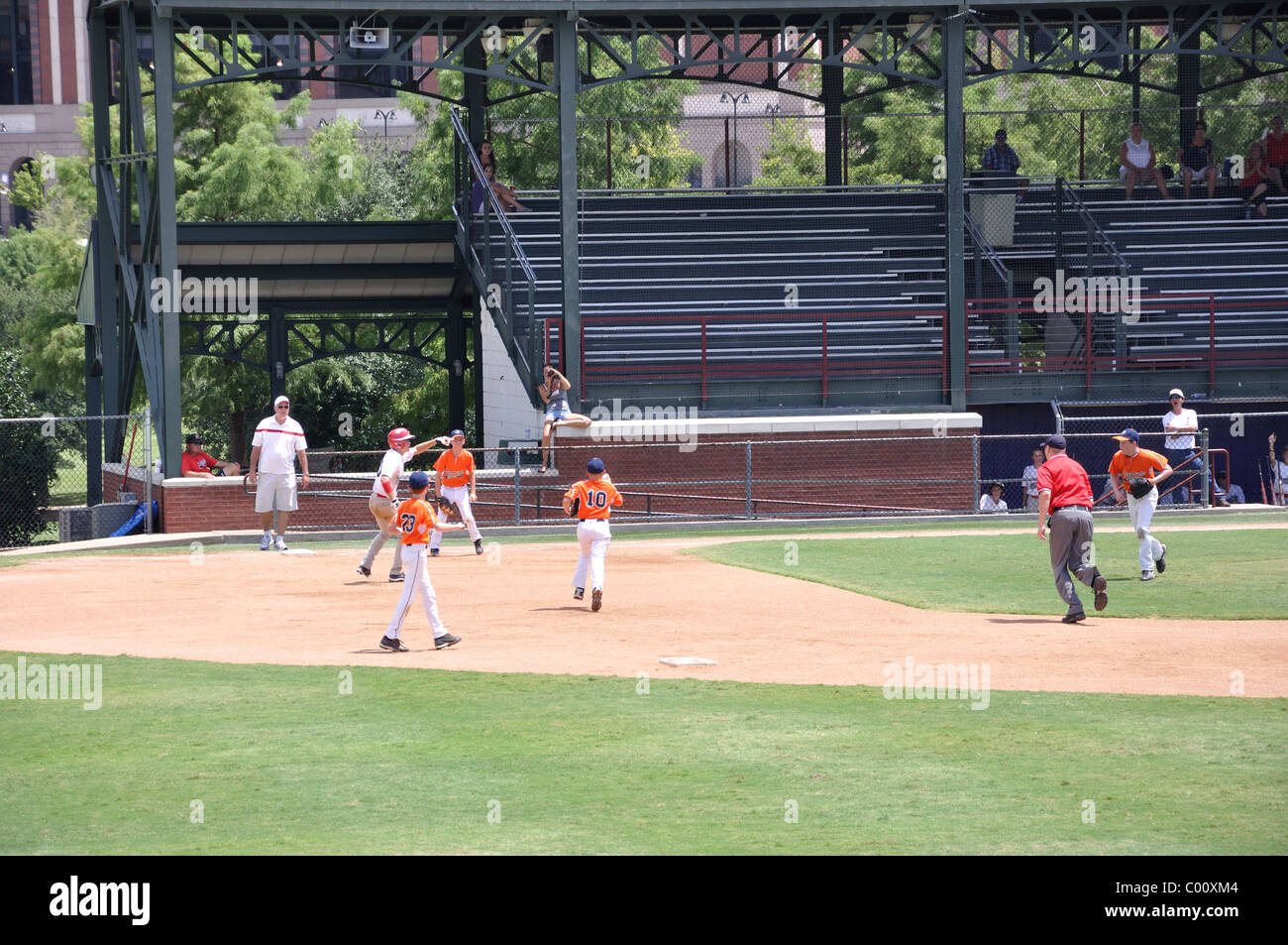 Kids playing baseball game, Texas, USA Stock Photo - Alamy