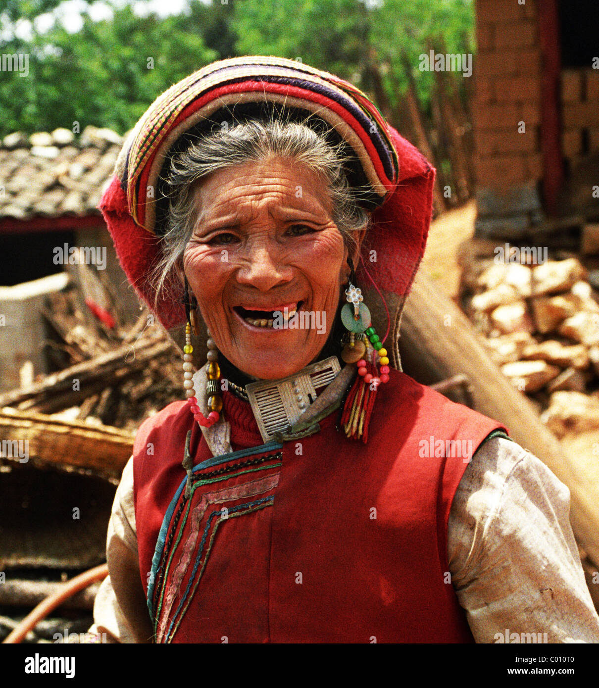 A happy Yi woman at her home in a remote village in Yunnan Stock Photo ...
