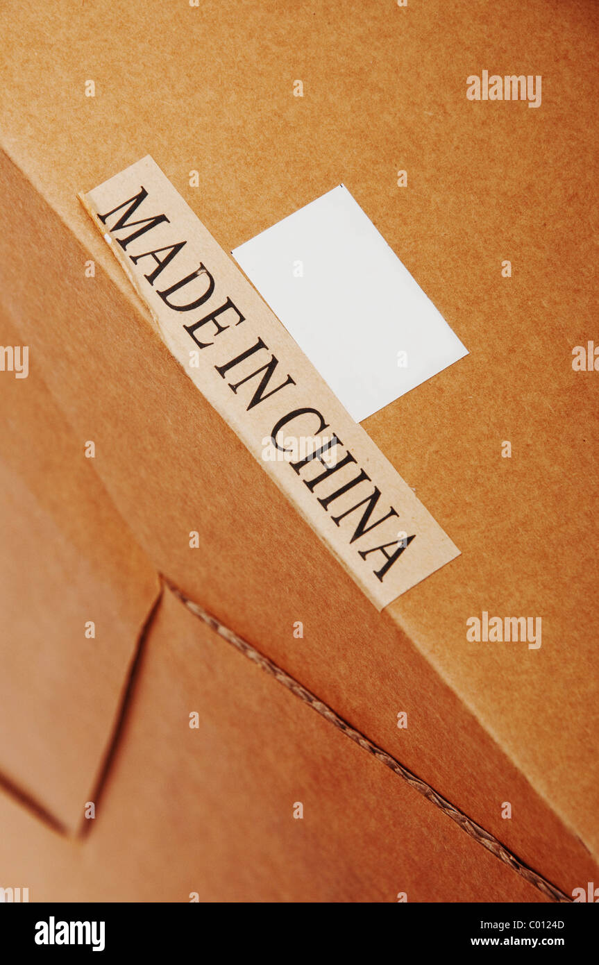 A cardboard with a paper label "Made In China Stock Photo - Alamy