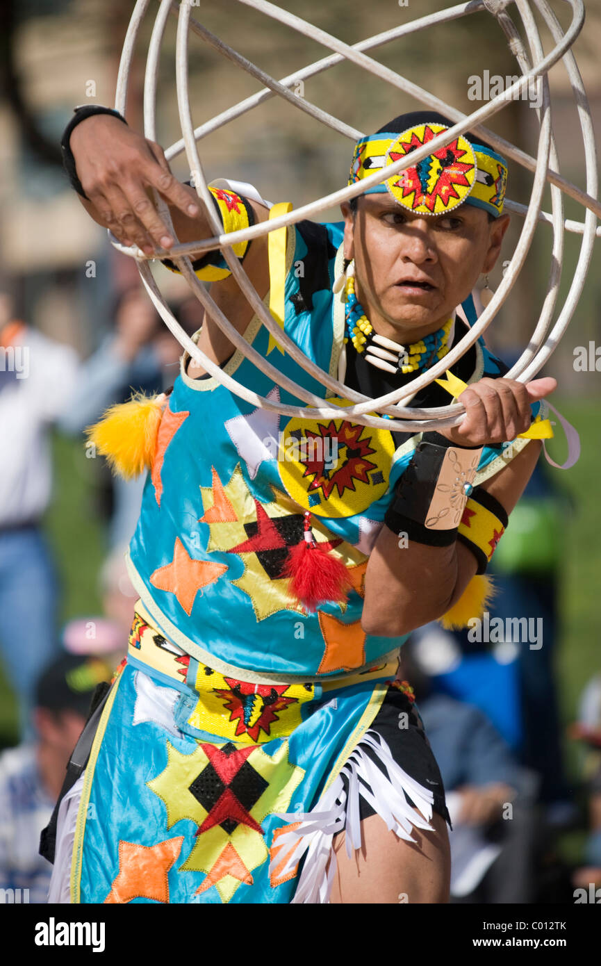 Dancer looks through hoops at the 2011 World Championship Hoop Dance ...