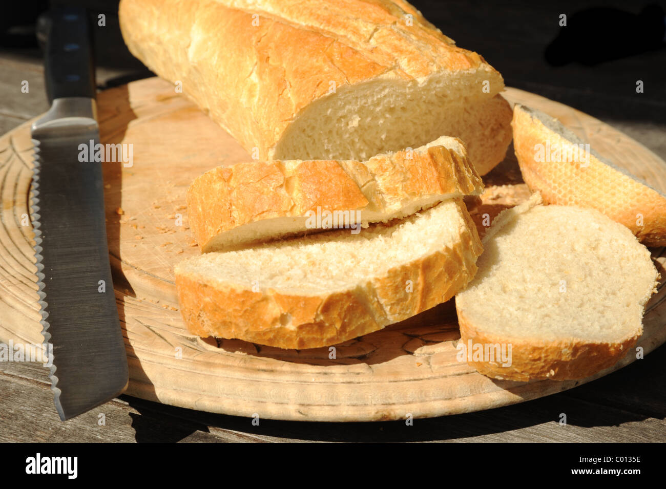 Cut bread knife hi-res stock photography and images - Alamy