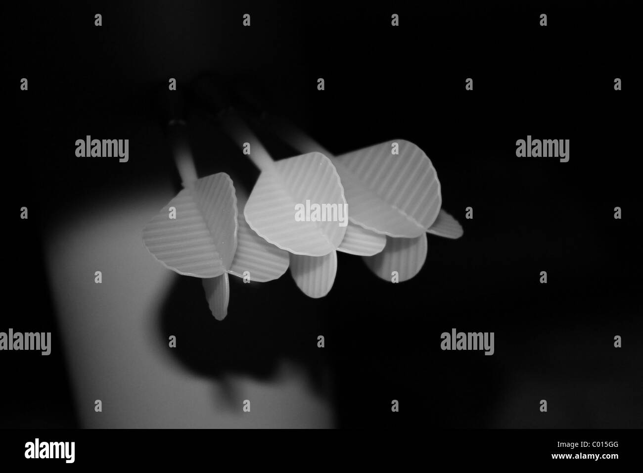 darts in the night Stock Photo - Alamy