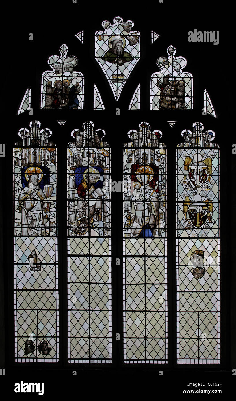 15th century stained glass window depicting saints and arma christi ...