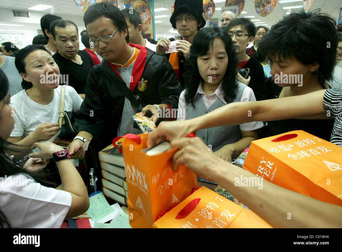 * POTTY FOR POTTER Potter-mania sweeps the world as the streets of ...