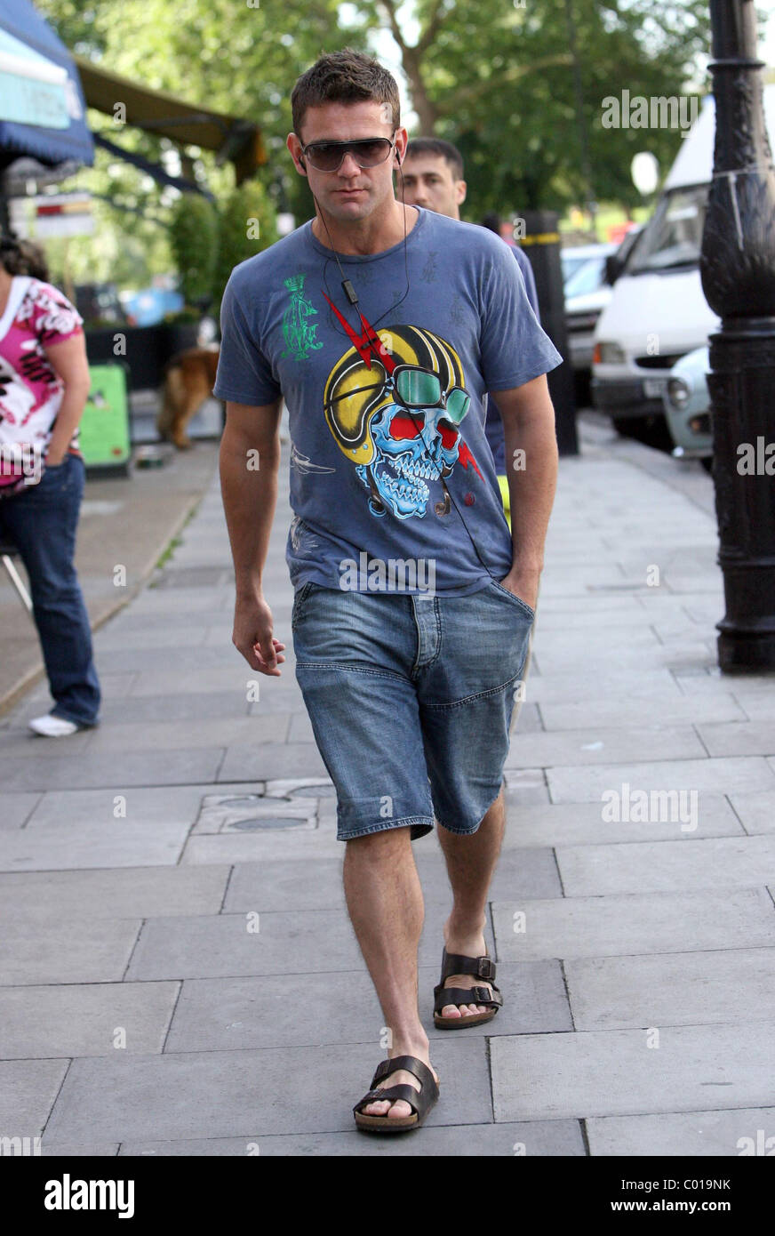 Scott Maslen walking through Primrose Hill on a lovely sunny day. On ...