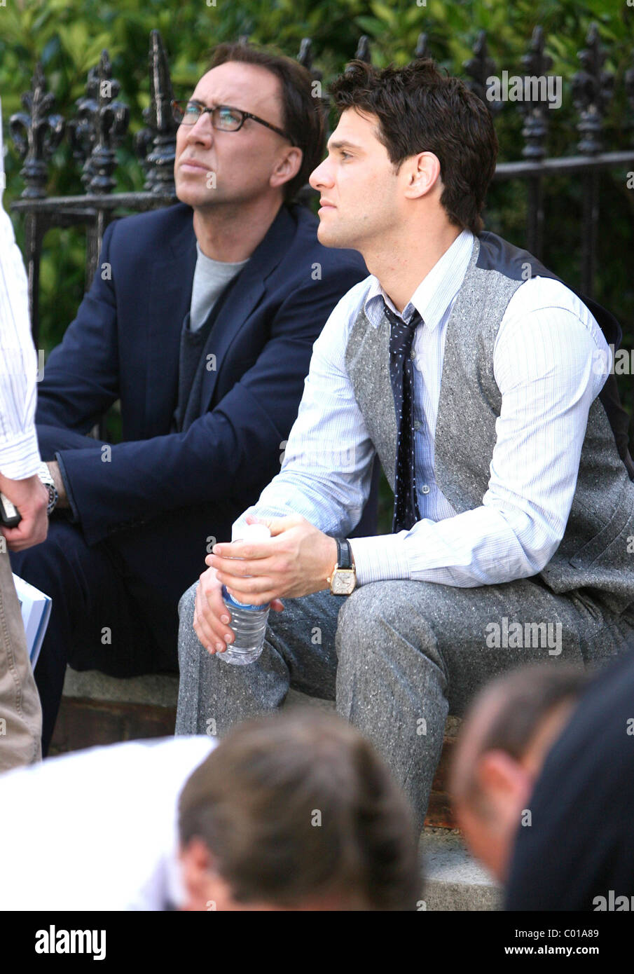 Nicolas Cage reading a book on set whilst on a break from filming on ...