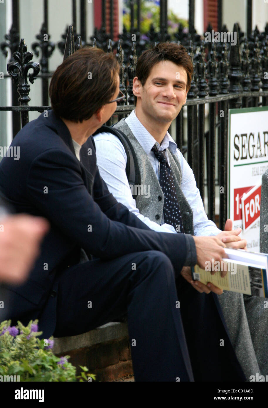 Nicolas Cage reading a book on set whilst on a break from filming on ...