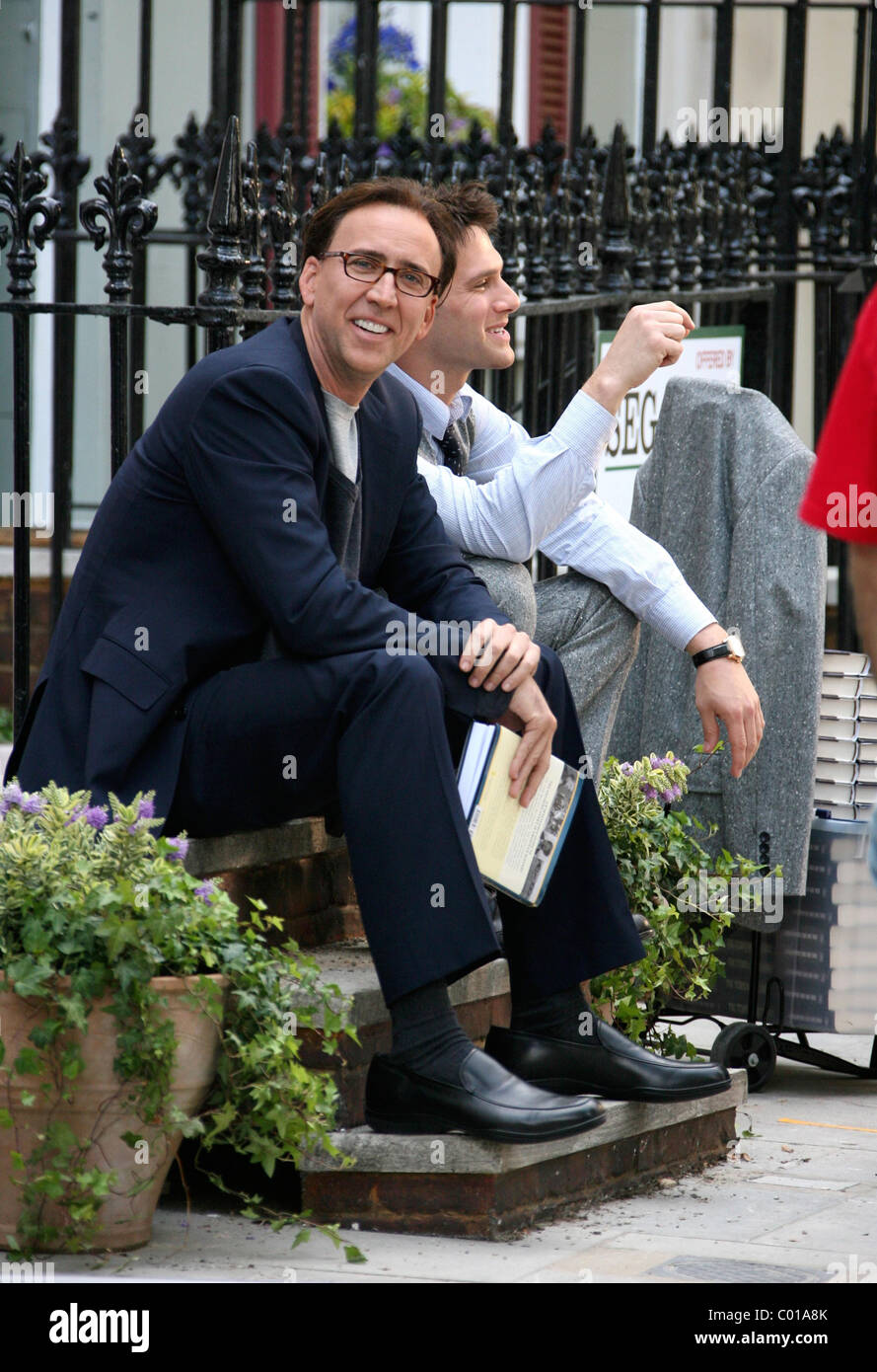 Nicolas Cage reading a book on set whilst on a break from filming on ...
