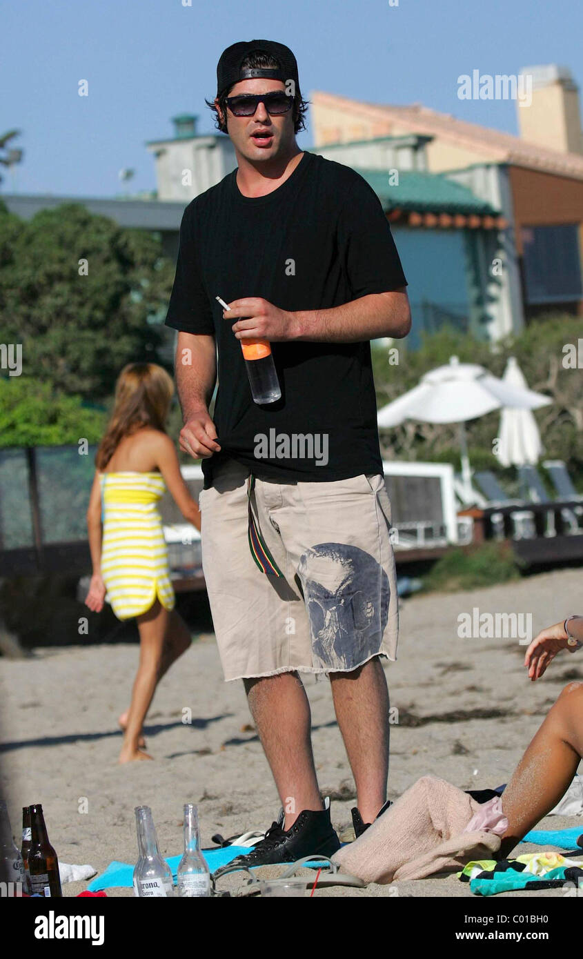 Brandon Davis Paris Hilton entertains her guests at her Malibu Beach ...