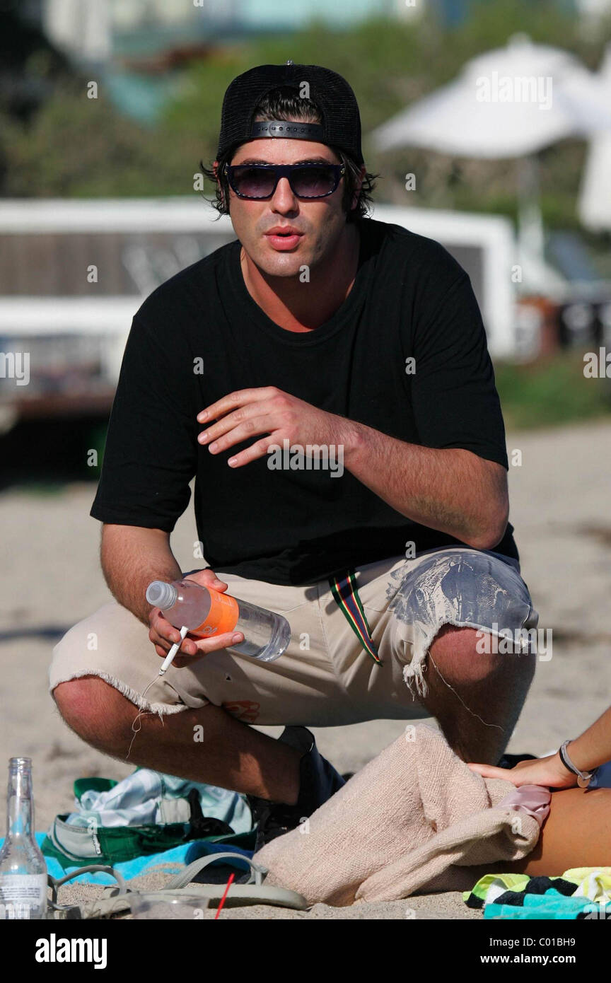 Brandon Davis Paris Hilton entertains her guests at her Malibu Beach ...