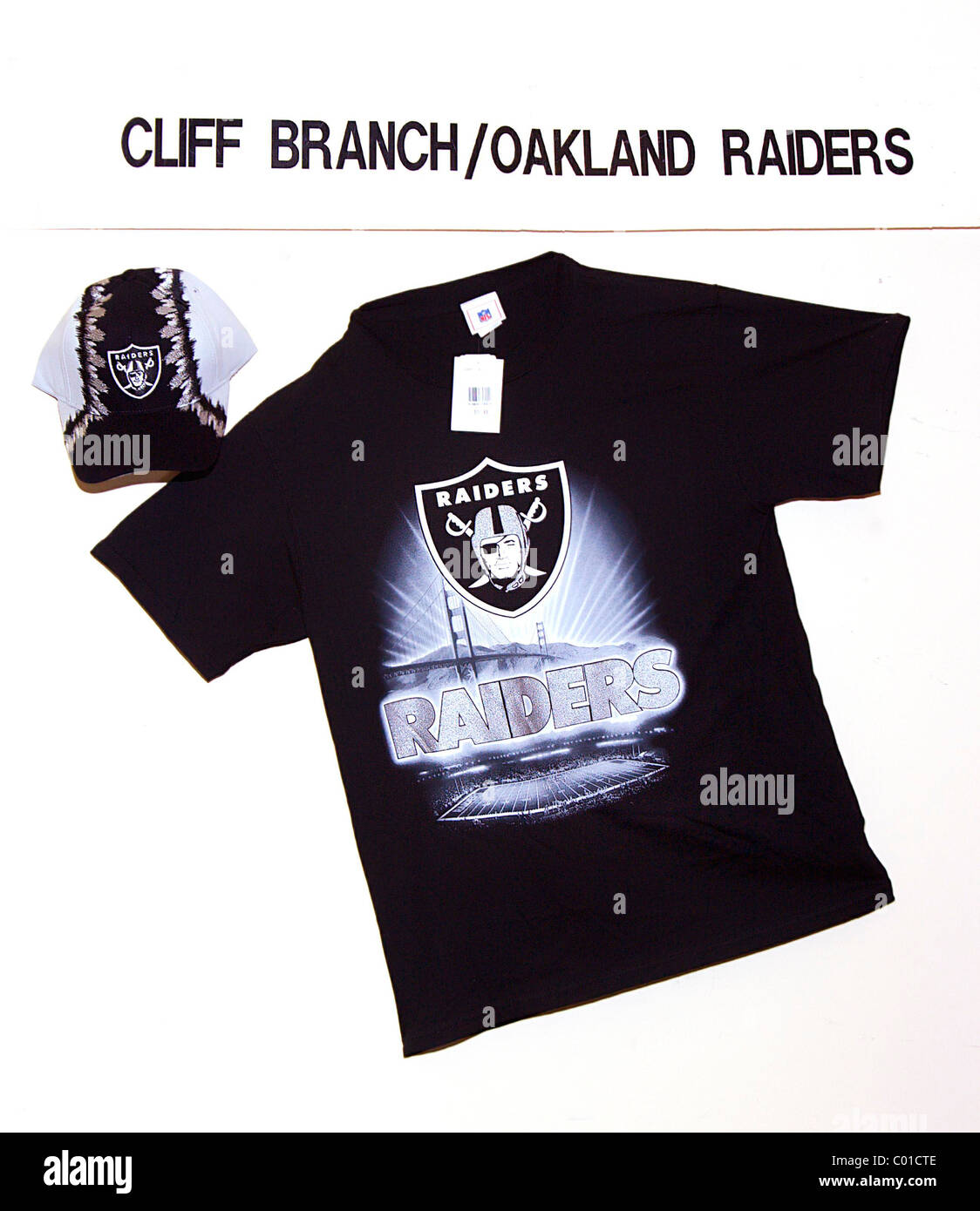 Atmosphere NFL Legend Cliff Branch signs memorabilia for fans at Wal ...