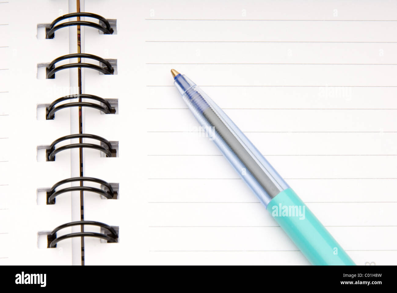 Ring bound notebook and pen introduces a business concept Stock Photo ...