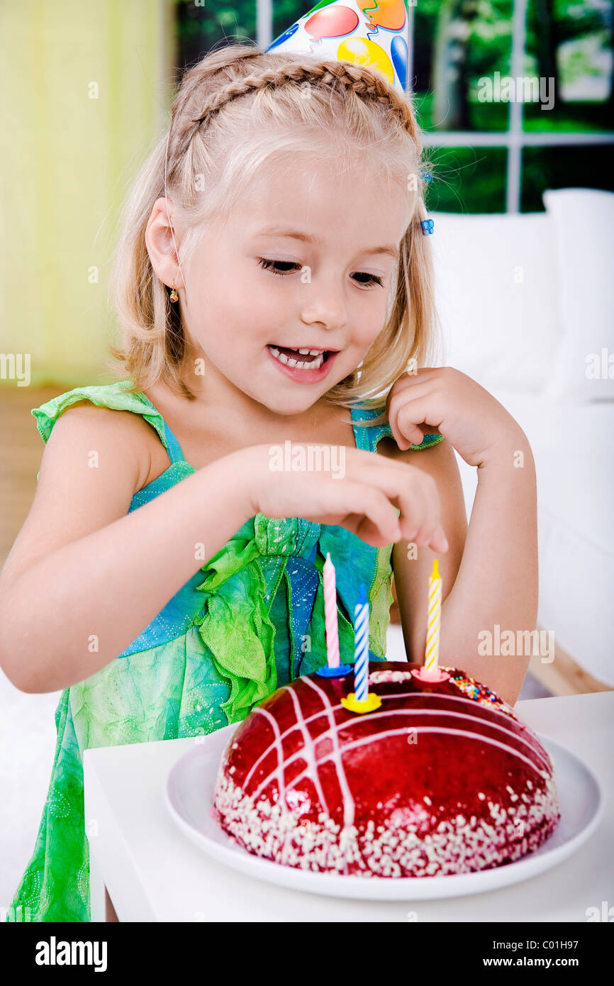Small girl celebrating her birthday Stock Photo - Alamy
