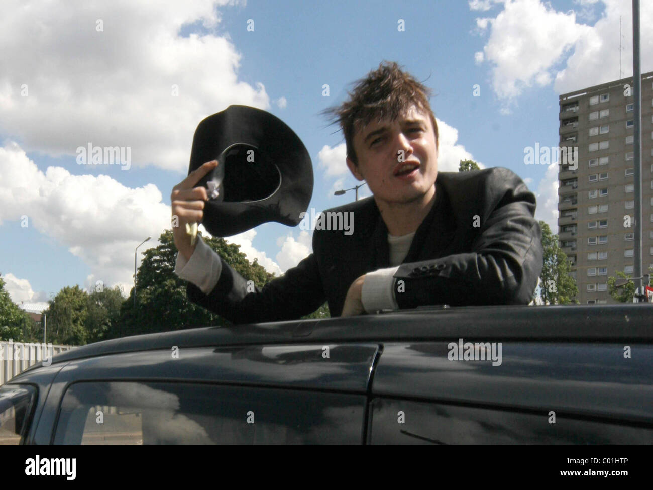Pete Doherty steps outside for a cigarette before his sentancing at the ...