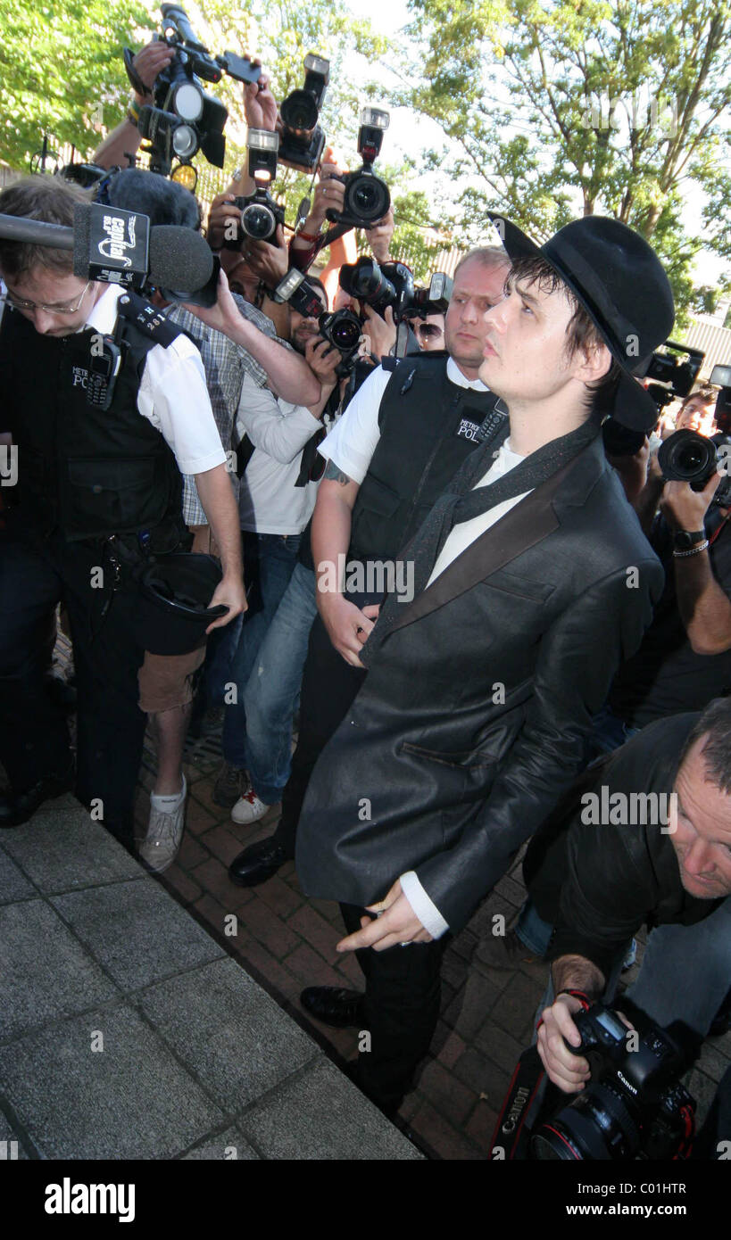 Pete Doherty steps outside for a cigarette before his sentancing at the ...