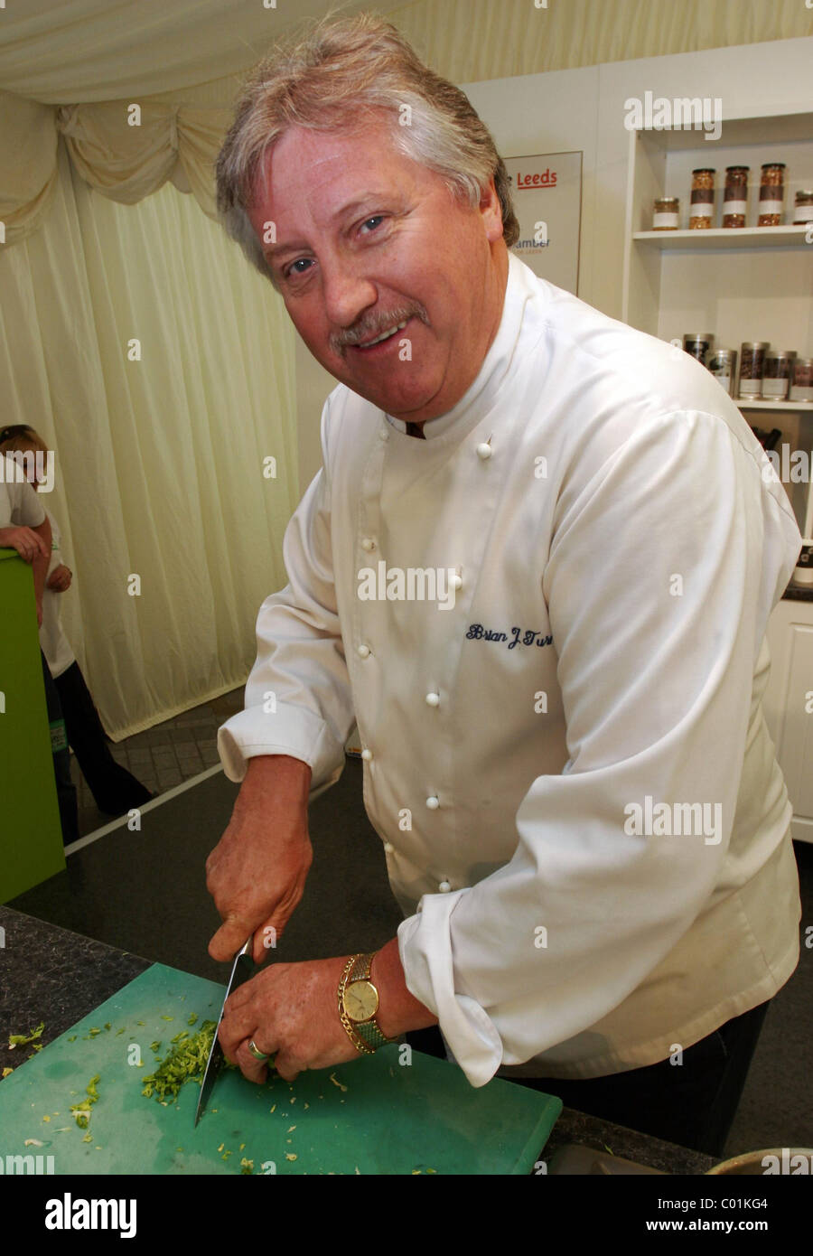 Brian Turner performs a live cooking demonstration for the food and ...