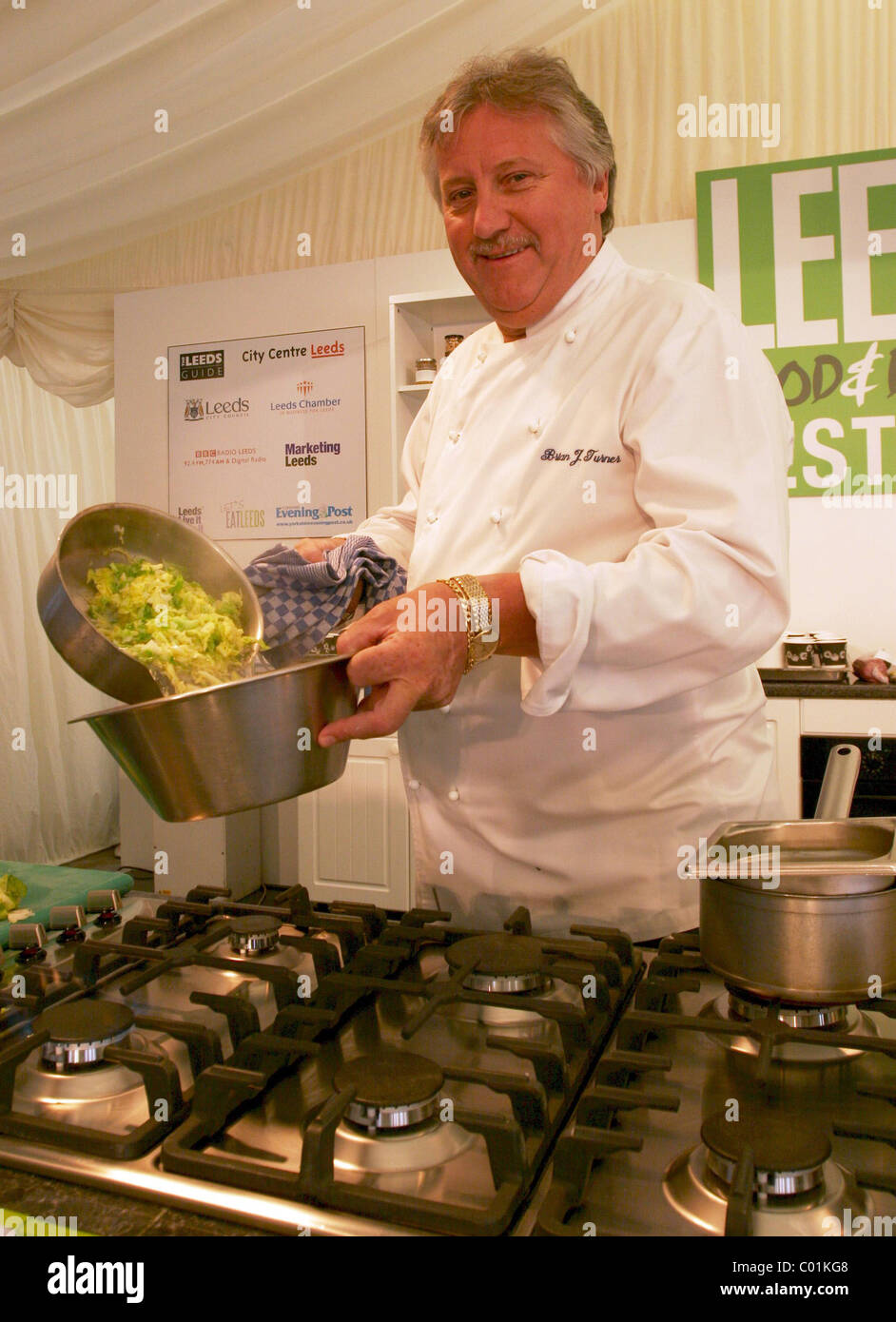 Brian Turner performs a live cooking demonstration for the food and ...