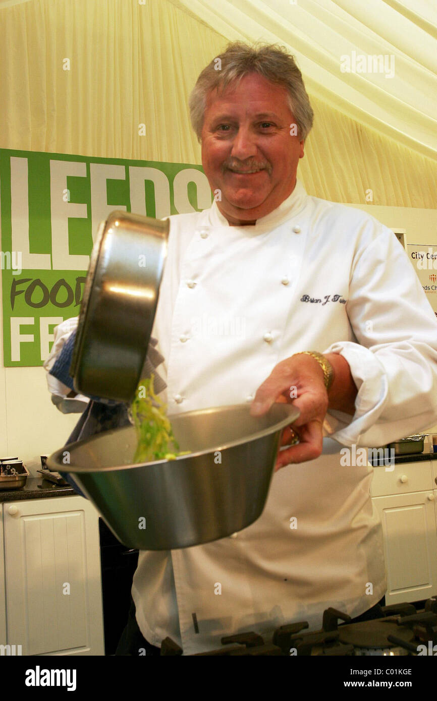 Brian Turner performs a live cooking demonstration for the food and ...
