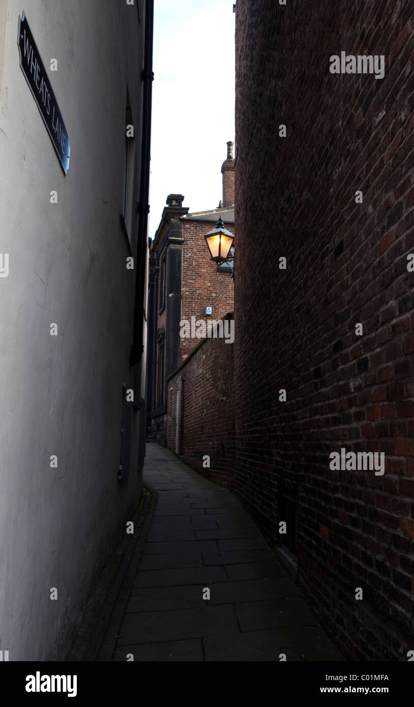Lamp glowing in alley Sheffield South Yorkshire England Stock Photo - Alamy