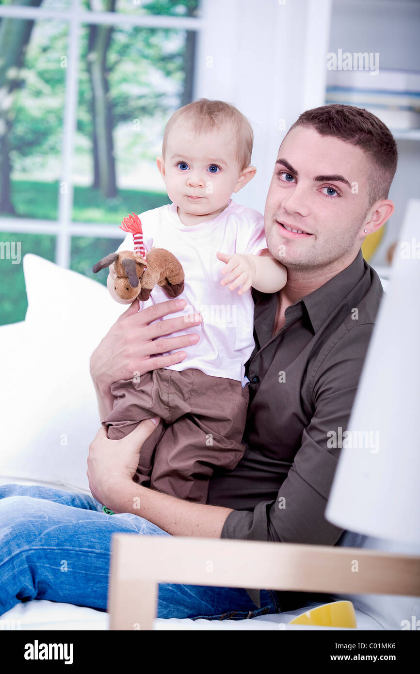 Baby looks old man hi-res stock photography and images - Alamy