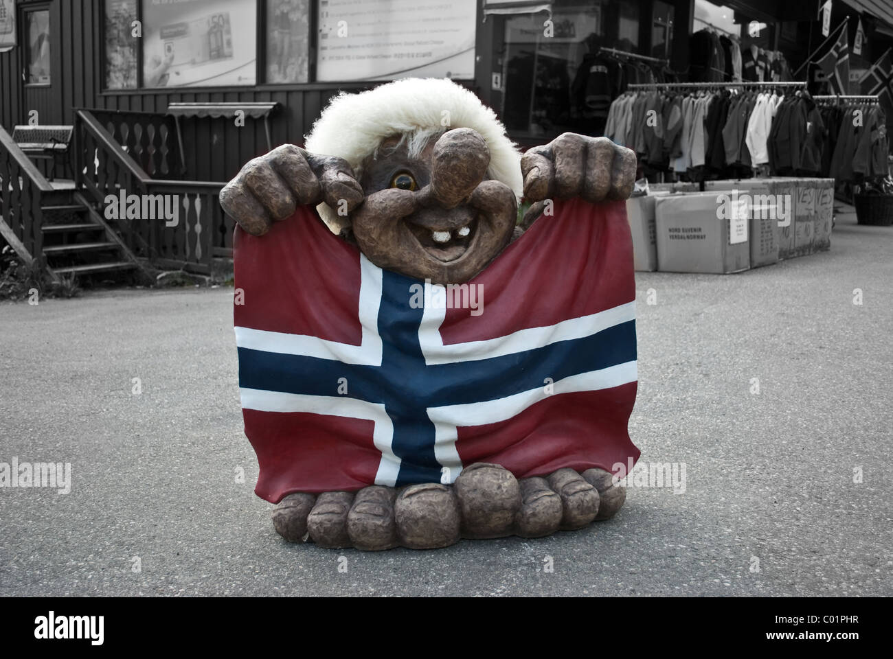 A troll holding the flag of Norway Stock Photo - Alamy