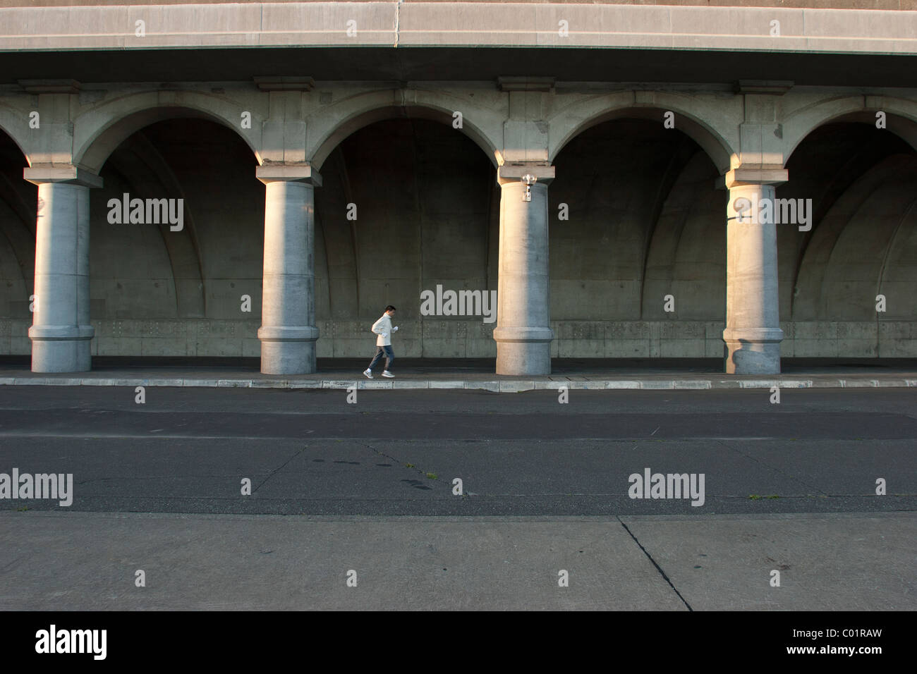 A jogger and a seawall/breakwater in Wakkanai, Hokkaido, Japan, June ...