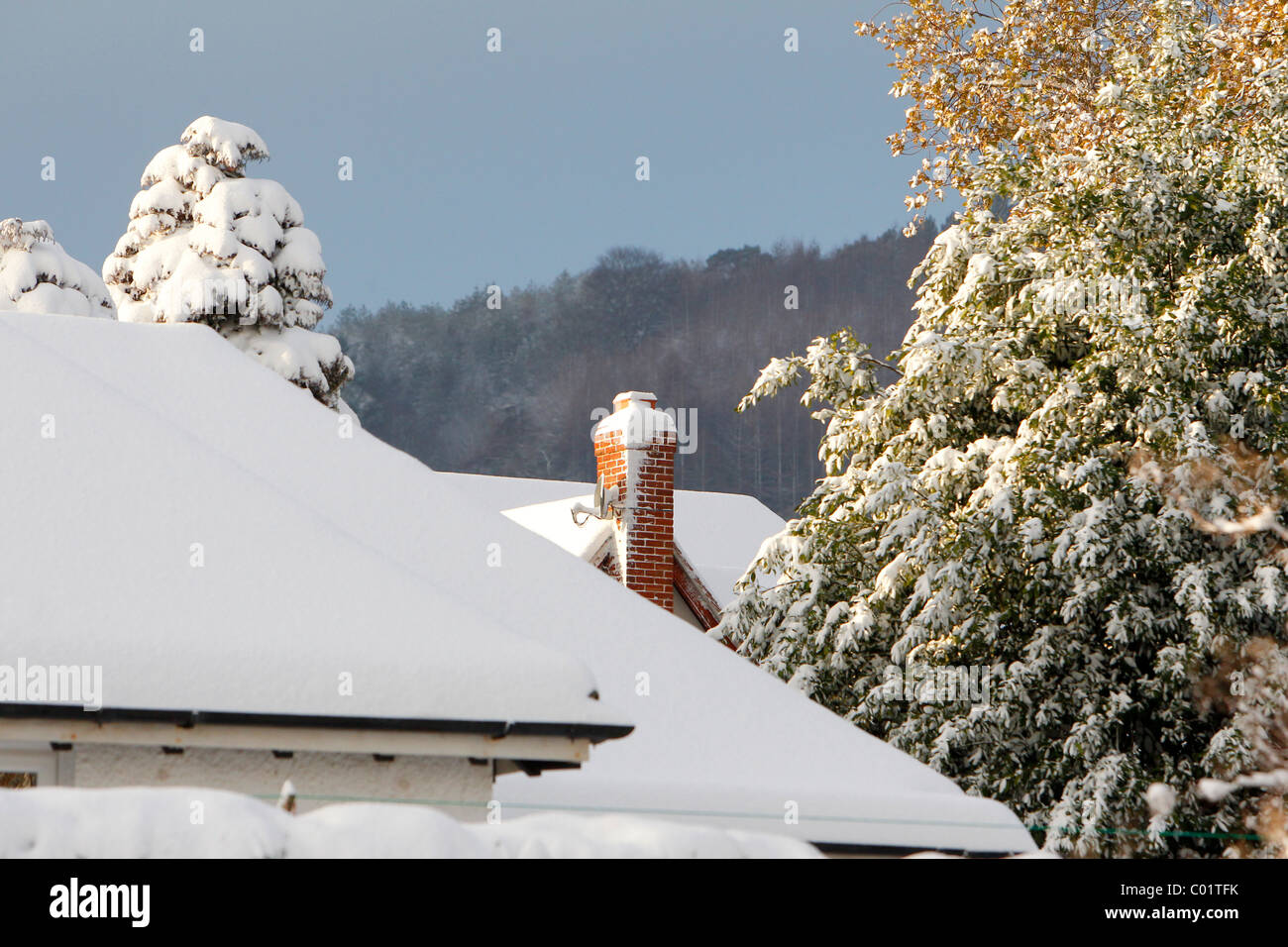 A snow covered chimney stack Stock Photo - Alamy