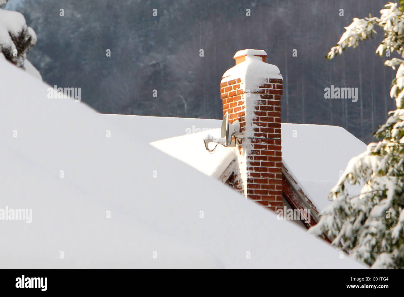 A snow covered chimney stack Stock Photo - Alamy