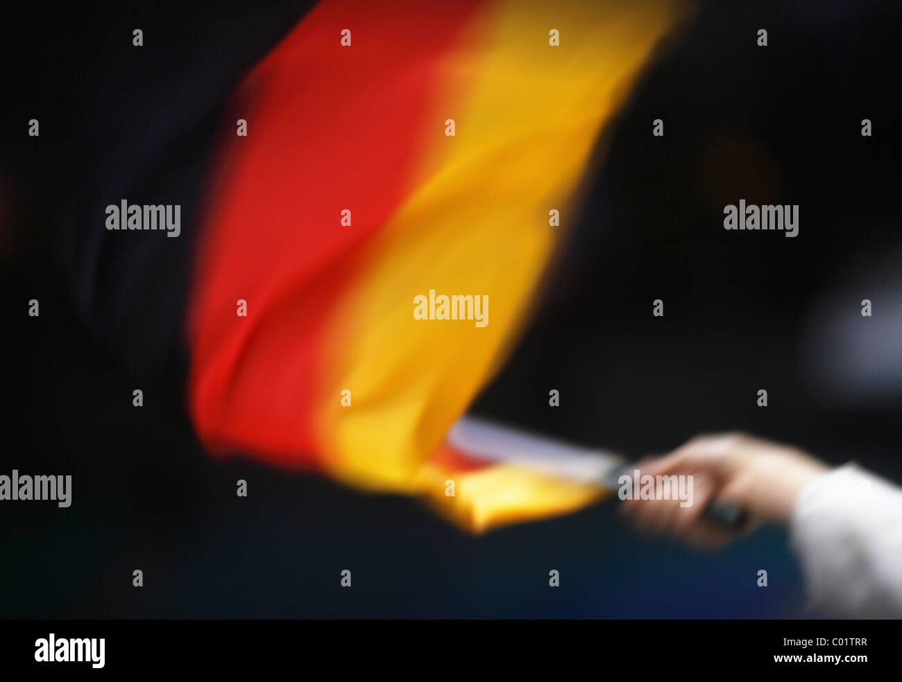 Hand with German flag Stock Photo - Alamy