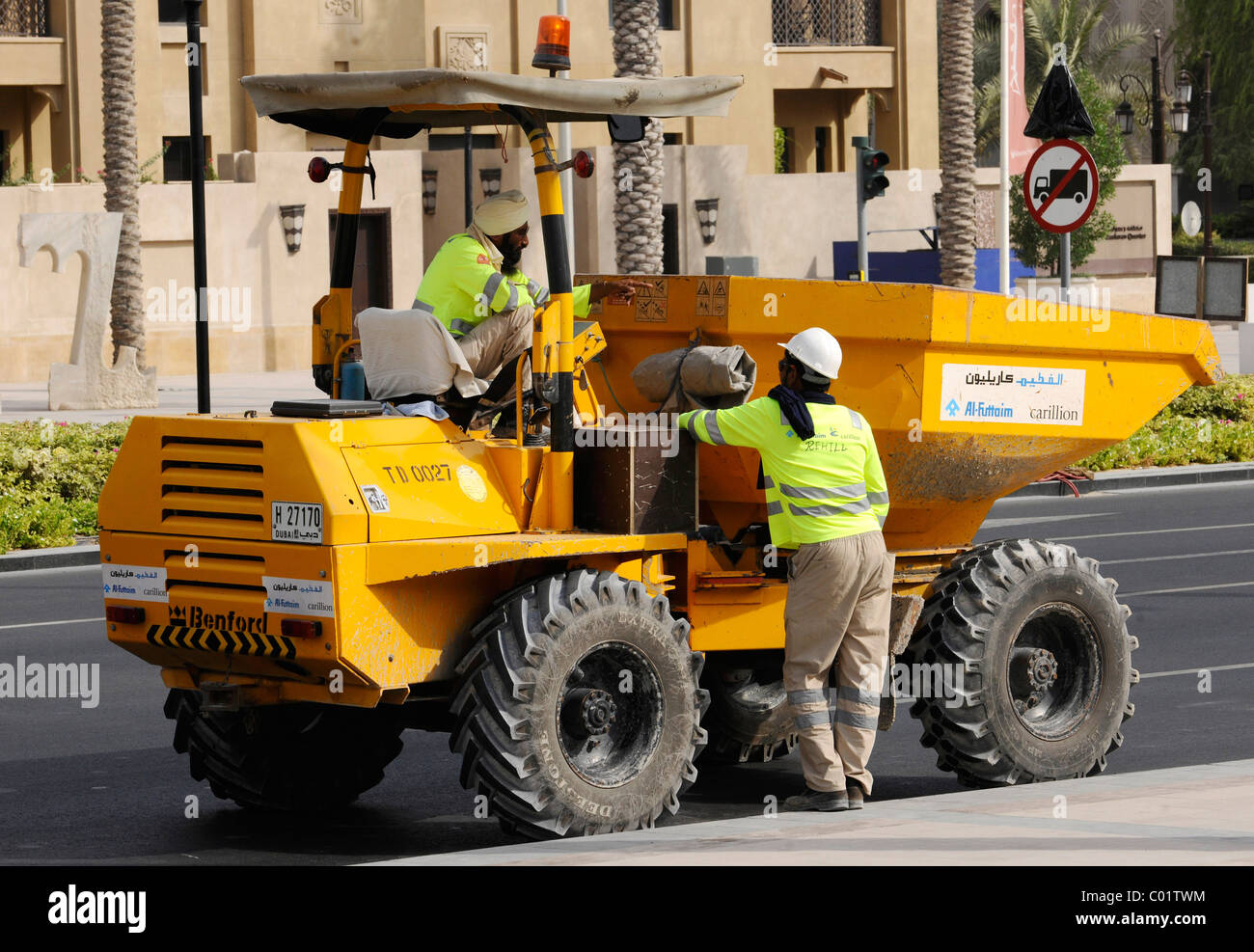 Construction workers talking with each other, Dubai, United Arab ...