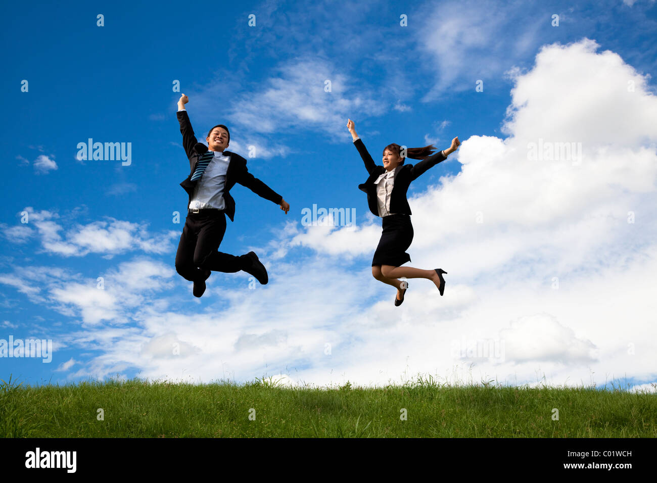Asian businesswoman jumping hi-res stock photography and images - Alamy