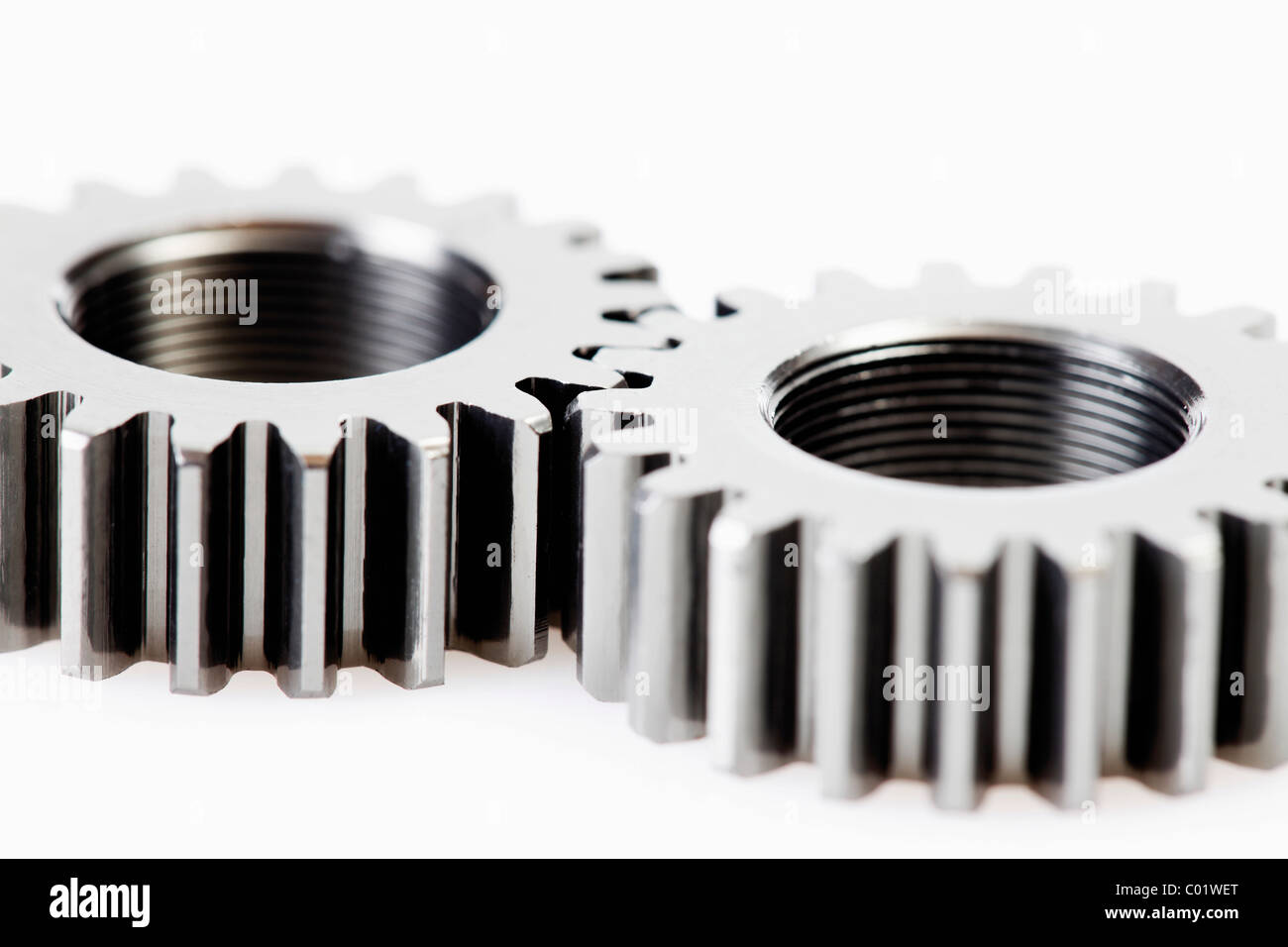 Two lying cog wheels Stock Photo - Alamy