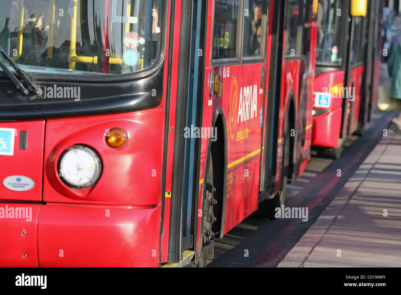 Red London buses in a line Stock Photo - Alamy