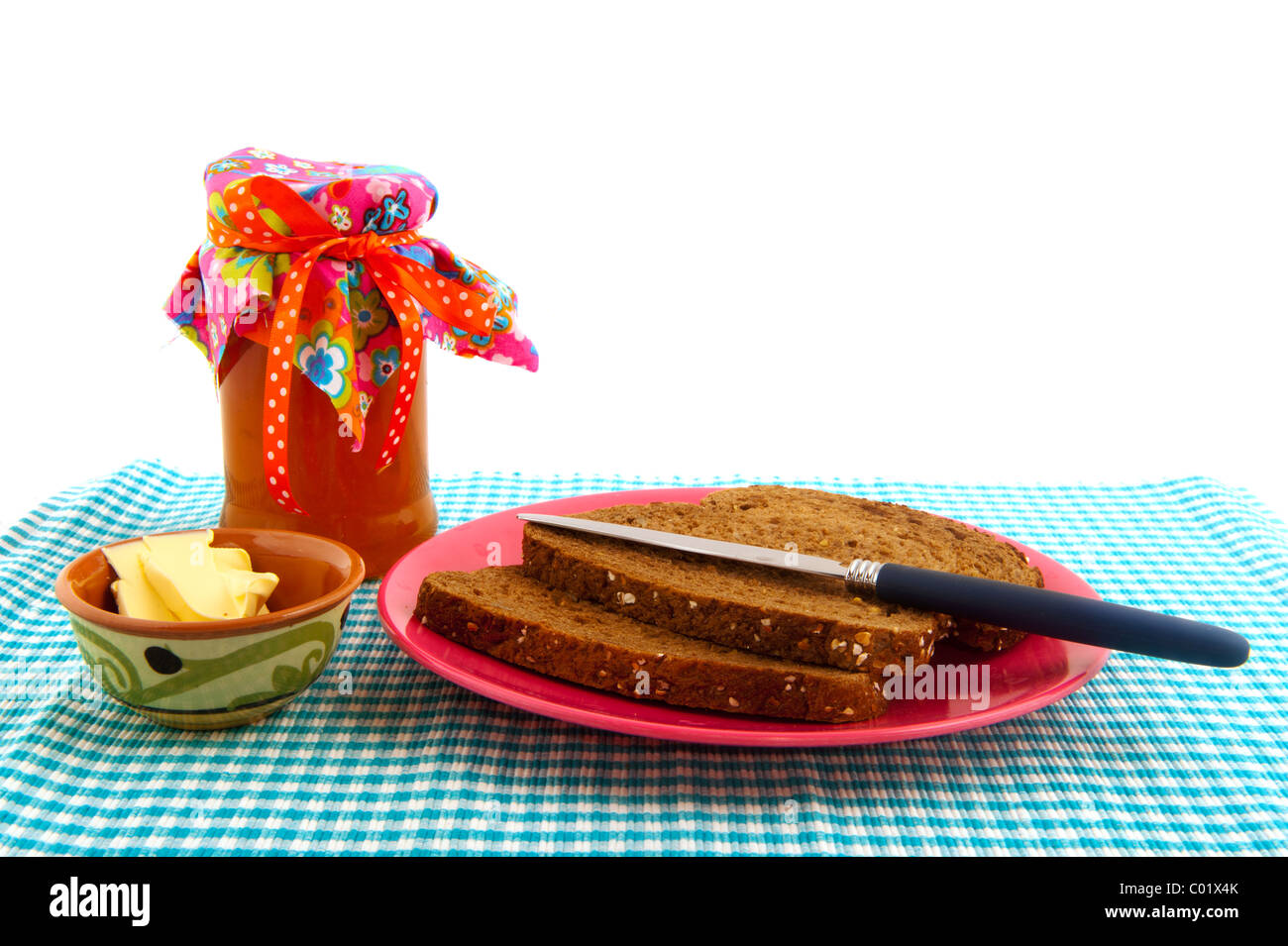 Making breakfast with preserved fruit jam bread and butter Stock Photo ...