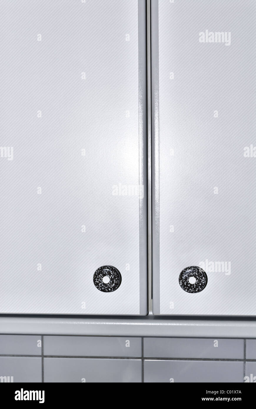 Kitchen cabinet closed doors detail Stock Photo - Alamy