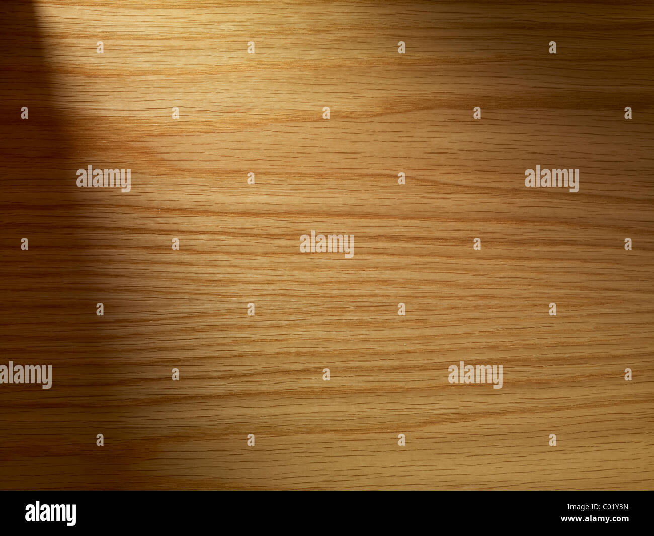 shaft of light on a oak wooden surface Stock Photo - Alamy