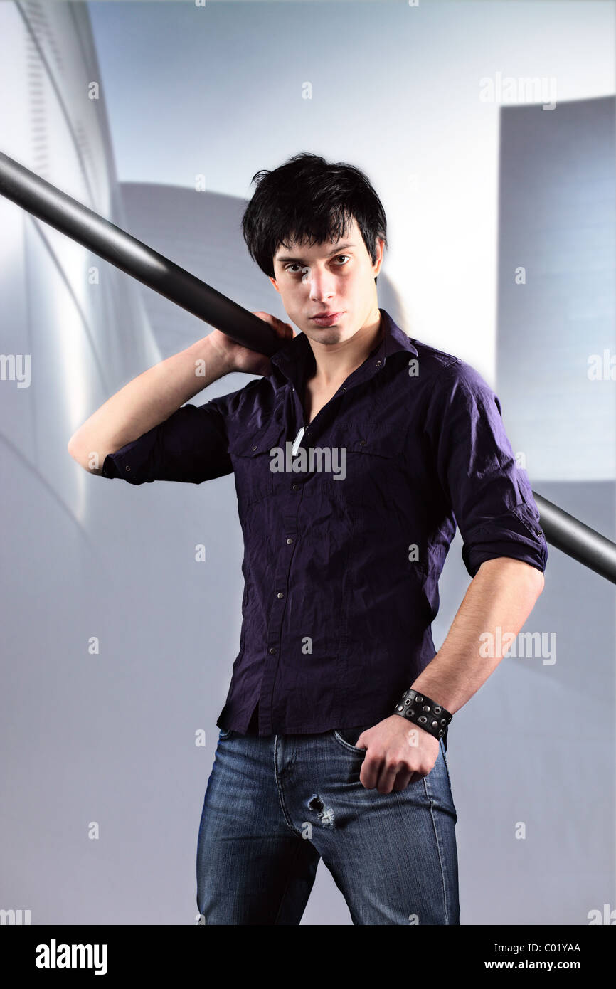 The young man with pipe Stock Photo - Alamy
