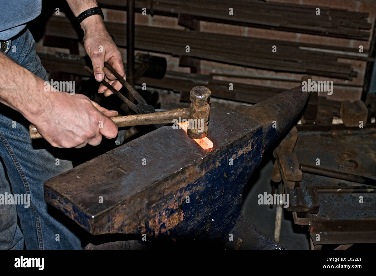 Hammering into shape Stock Photo - Alamy