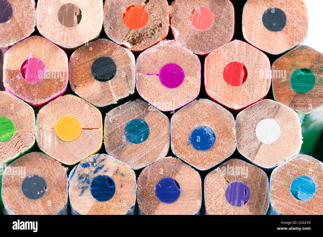 background pattern of a stack of colorful colored pencils seen from the ...