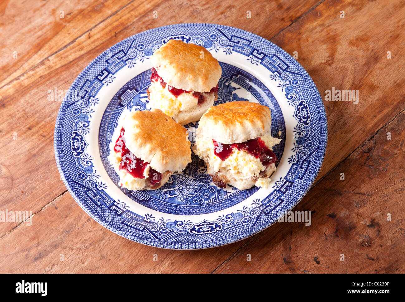 Plated three scones on the wooden table Stock Photo - Alamy
