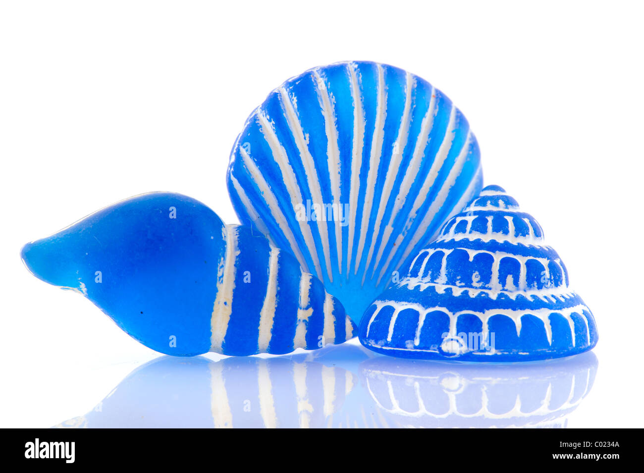 Several blue glass shells isolated over white Stock Photo - Alamy