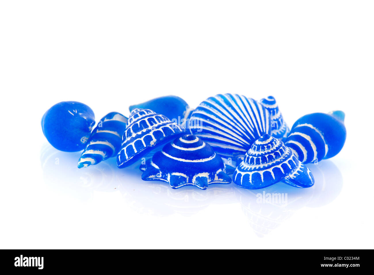 Several blue glass shells isolated over white Stock Photo - Alamy